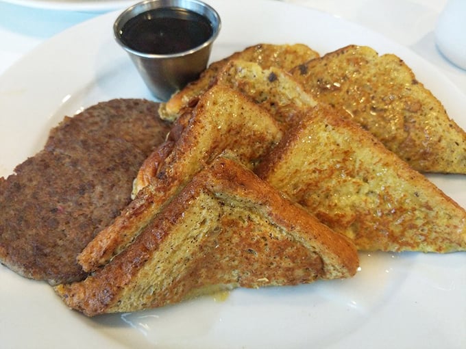 French toast that's had a proper education &ndash; crisp edges, custardy centers, and enough cinnamon to remind you that breakfast is actually dessert in disguise.