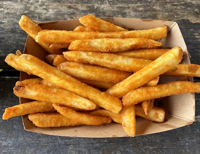 French fries that understand their supporting role—crispy enough to stand alone but humble enough to complement the seafood stars of the show.
