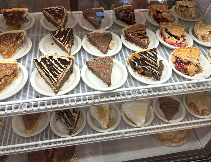 Pie paradise! Like a dessert United Nations where chocolate, fruit, and cream varieties coexist in delicious harmony.