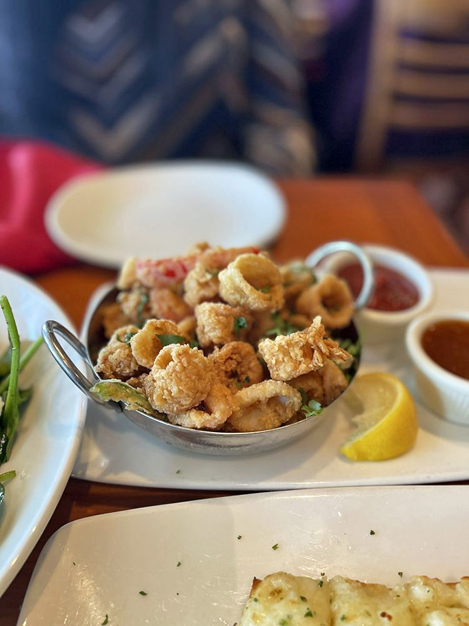 Golden-fried calamari that passes the ultimate test &ndash; it doesn't need the sauce, but you'll want it anyway.