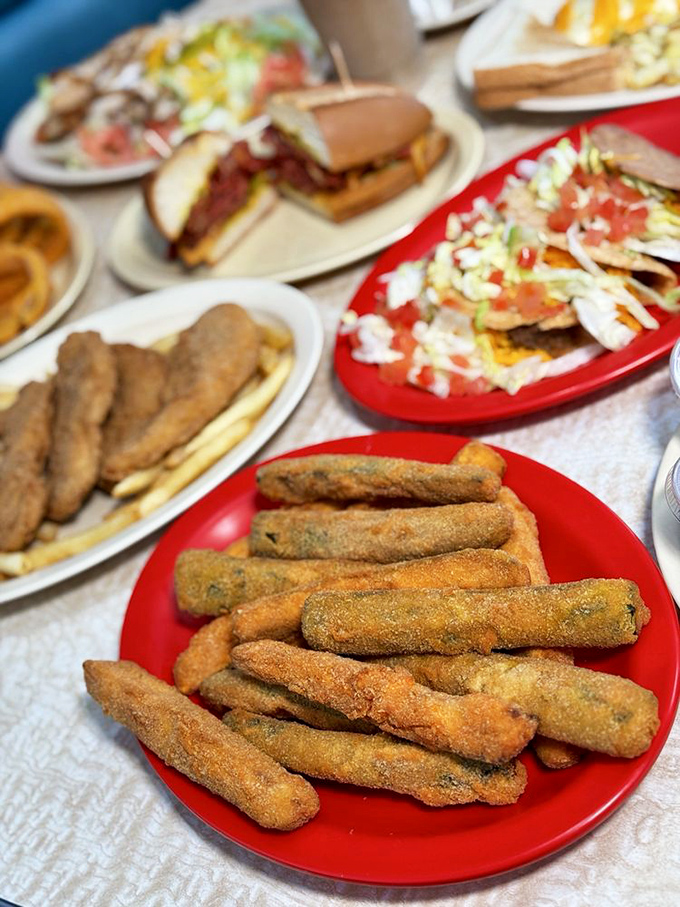 Golden-brown zucchini sticks lined up like soldiers ready for dipping duty. Vegetables have never been this exciting since the invention of ketchup.