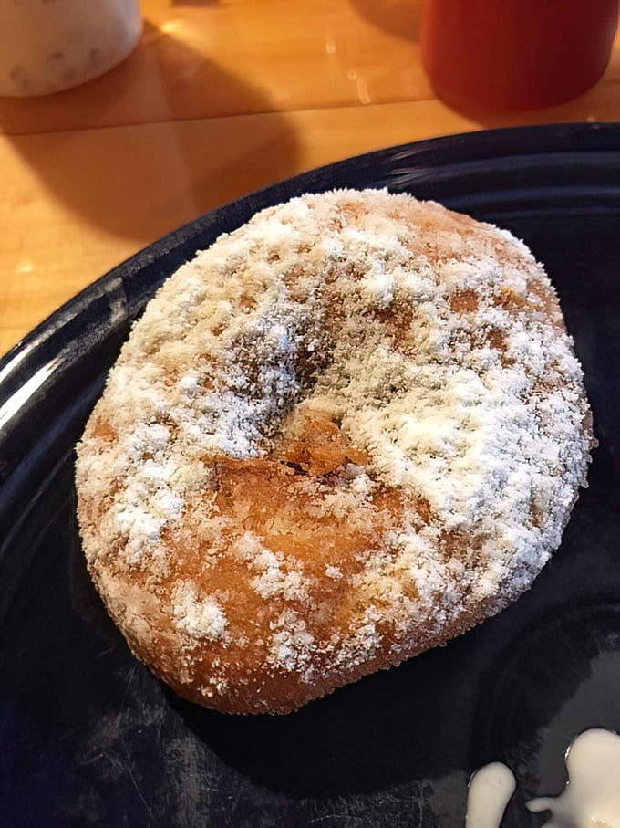 Powdered sugar dusted fry bread that transforms ordinary dough into a dessert worth driving for. Simple pleasures elevated to art form.