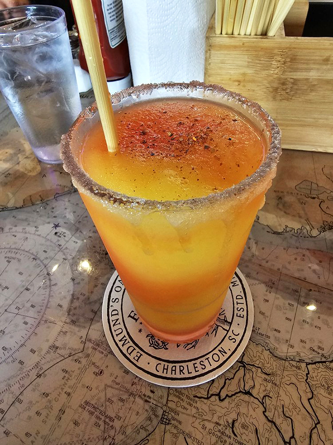 Not just a drink&mdash;it's a sunset in a glass. This spicy-rimmed concoction sits atop a map, plotting your course to relaxation.