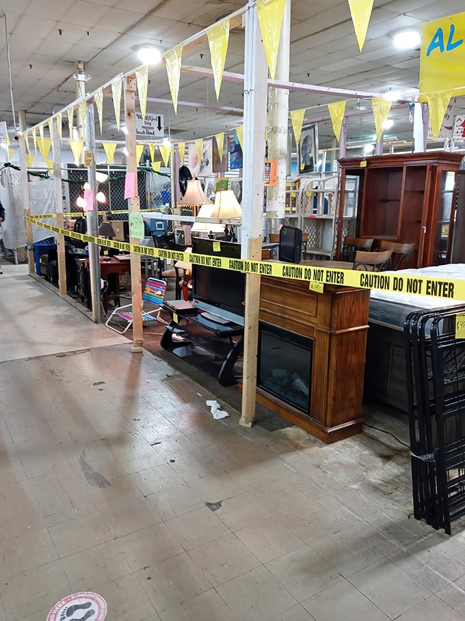 Yellow caution tape: either a crime scene for retail prices or just a creative way to section off furniture finds.