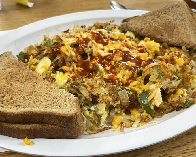This isn't just an omelet with toast and potatoes&mdash;it's what morning victory looks like after surviving the alarm clock's tyranny.