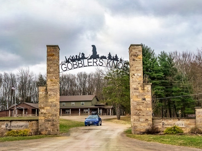 Gobbler's Knob entrance: where ordinary stone pillars mark the gateway to extraordinary weather forecasting methods that somehow captured America's imagination and Hollywood's attention.