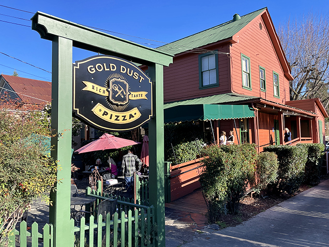 Gold Dust Pizza serves up slices in a building that's seen more history than a Ken Burns documentary. The outdoor patio beckons.