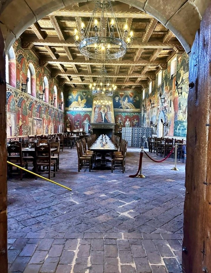The Great Hall's vibrant frescoes and massive wooden table could convince you you're dining with Italian nobility instead of fellow tourists from Sacramento.