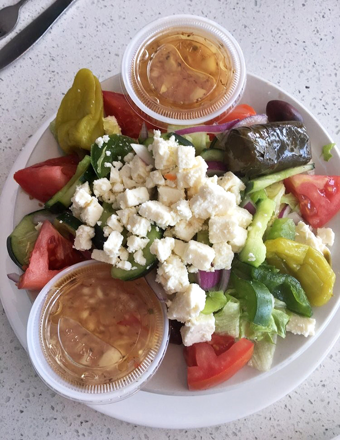 This Greek salad isn't just fresh&mdash;it's a Mediterranean vacation without the airfare. The feta cheese crumbles are generous enough to make Zeus himself nod in approval.