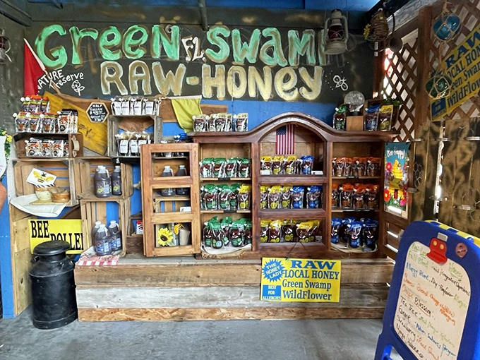 Green Swamp Raw Honey display looks like something from a country store time capsule. Nature's sweetener, packaged with rustic charm that makes plastic honey bears look positively pedestrian.