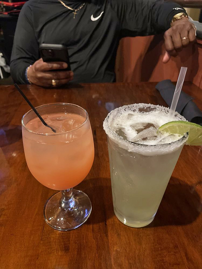 Vacation officially begins when the bartender slides these across the bar&mdash;a salt-rimmed margarita and something pink that promises good decisions.
