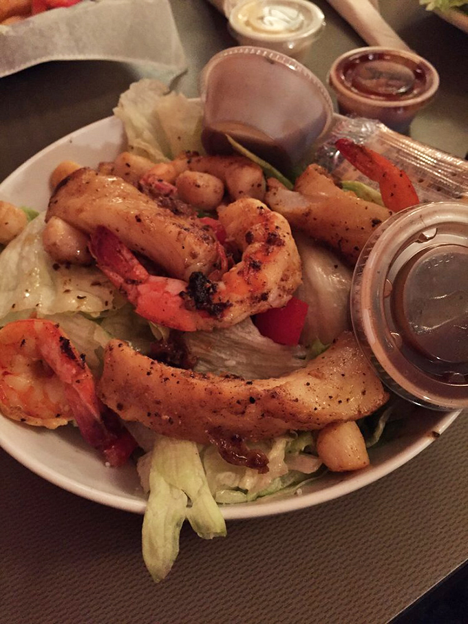 Blackened shrimp that didn't just visit the spice cabinet—they moved in and redecorated. The perfect protein-packed salad for Gulf Coast heat.