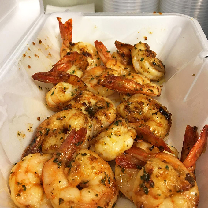 These grilled shrimp aren't just cooked—they're respected, seasoned with herbs that complement rather than overwhelm their natural sweetness.