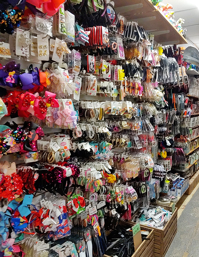 Hair accessory heaven! This wall of colorful clips and bands isn't just merchandise &ndash; it's a rainbow of possibilities for transforming ordinary ponytails into statements.