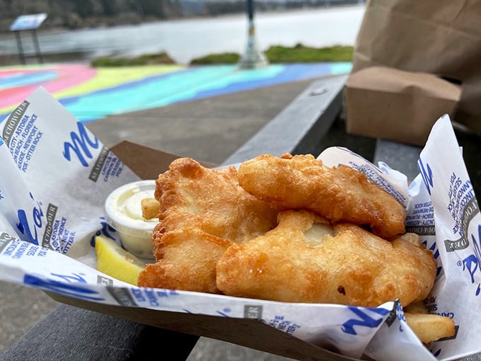 Golden-battered halibut and fries served in Mo's signature paper-lined basket. This isn't just fish and chips&mdash;it's the reason stretchy pants were invented.