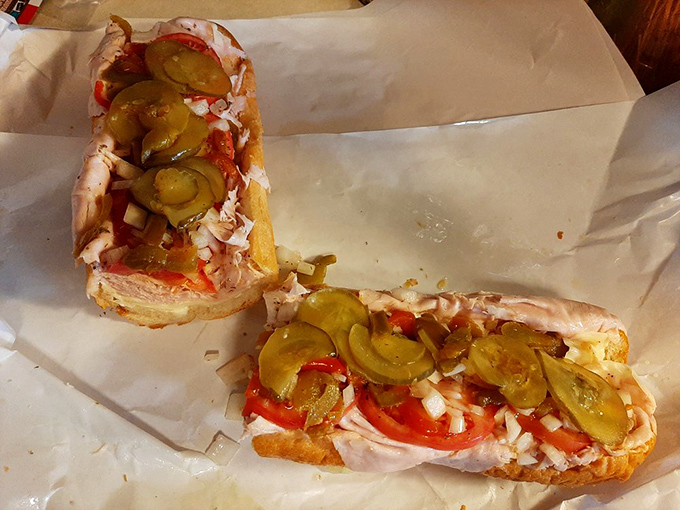 Simple ingredients, extraordinary results. This sandwich proves that sometimes less is more, especially when "less" includes perfectly layered meats and garden-fresh toppings.