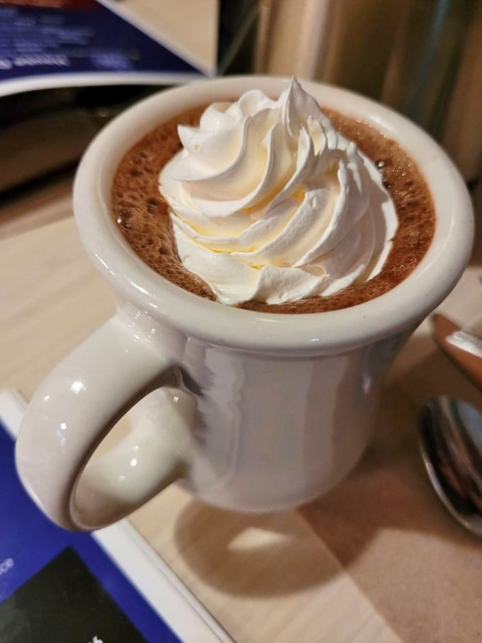 Hot chocolate elevated to an art form&mdash;where the whipped cream doesn't just top the drink, it creates a pillowy island of sweetness.