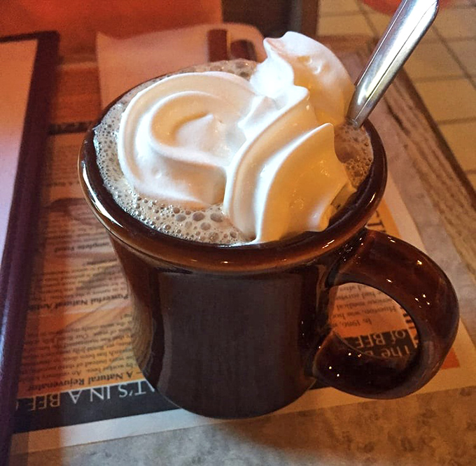 Hot cocoa topped with a cloud of whipped cream&mdash;proof that sometimes the simplest pleasures deliver the most profound satisfaction. 