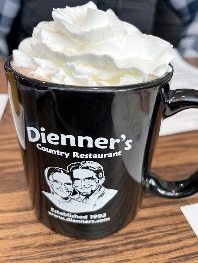 The dining room's simple decor and warm lighting create an atmosphere where conversations flow as easily as the coffee, making strangers feel like neighbors.