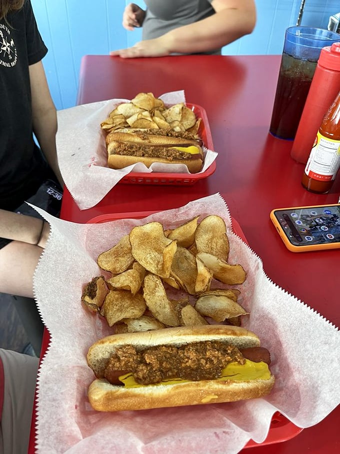 All-beef hot dogs dressed to impress, proving diner classics never go out of style.