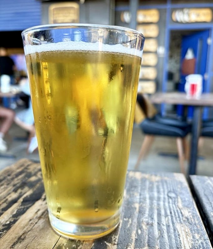 Nothing complements smoked meat like a cold beer on a wooden table. It's nature's perfect pairing, like peanut butter and jelly for grown-ups.