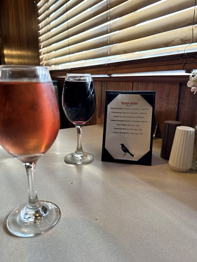 Wine that doesn't require a second mortgage. The house selections offer California and Italian options that complement rather than compete with the food.