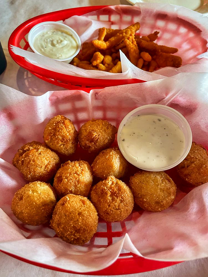 Hush puppies golden as doubloons alongside crispy fried treats&mdash;the kind of comfort food that makes you want to hug the chef.
