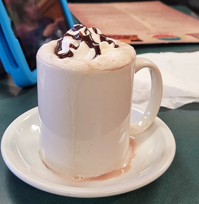 Coffee elevated to dessert status with a chocolate drizzle crown. Morning pick-me-up or afternoon indulgence? The beauty is you don't have to choose.