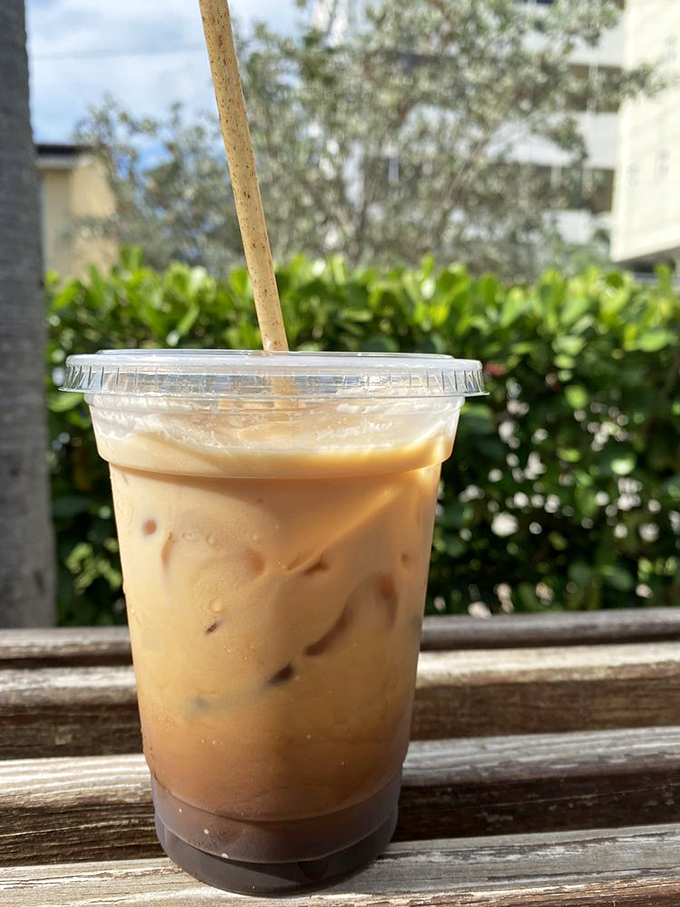 Iced caf&eacute; con leche&mdash;where Cuban coffee tradition meets Florida heat in a cup that's basically liquid motivation with a straw.