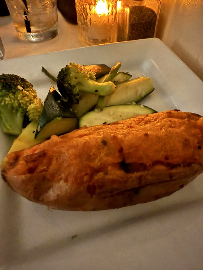 Simple pleasures done right: a perfectly cooked piece of fish alongside vegetables that haven't been forgotten in the kitchen.