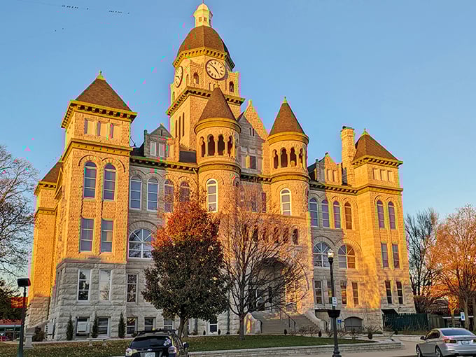The Jasper County Courthouse glows like a golden palace at sunset. Romanesque revival architecture that makes government business look downright majestic.