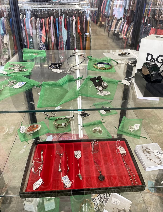 Jewelry displayed like buried treasure. Each piece carries its own history, waiting for you to write its next chapter around your neck or wrist.