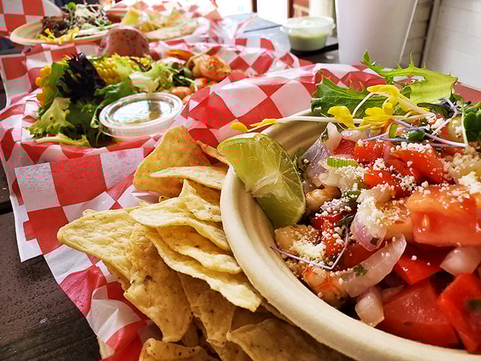 Fresh ceviche served with a side of Florida sunshine. Those tortilla chips aren't just garnish&mdash;they're essential tools for scooping up every last bit of zesty goodness.