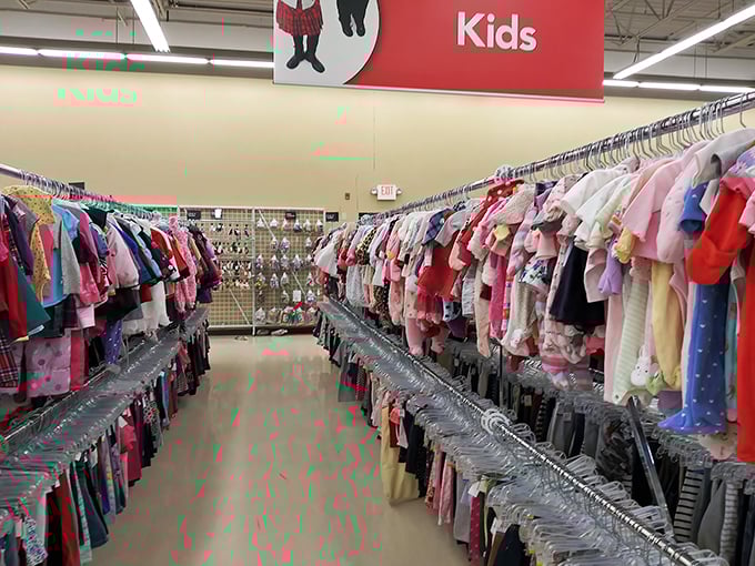 Tiny formal dresses and miniature jeans hang in neat rows, outgrowing their first owners but perfect for your growing brood.