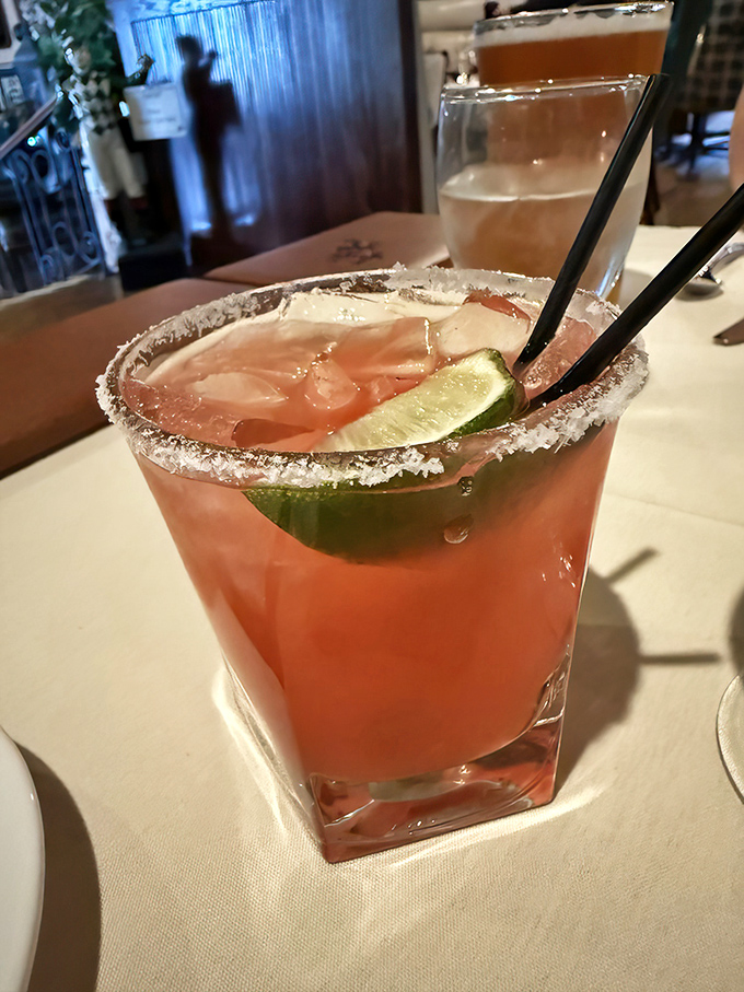 The La Dama Rosa cocktail: where tequila meets grapefruit in a salt-rimmed glass. Like a Central Valley sunset in liquid form.