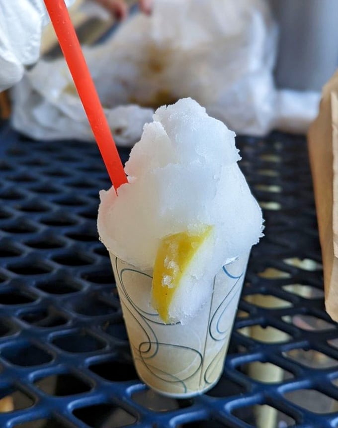 Lemon Italian ice: summer's perfect counterpoint to beef-induced warmth. Like taking a refreshing dip in Lake Michigan after a sauna.