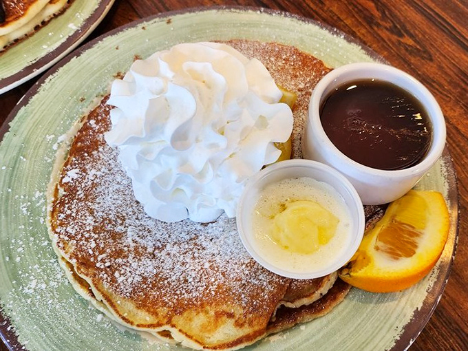 These pancakes, dusted with powdered sugar and topped with cloud-like whipped cream, are what breakfast dreams are made of. Fluffy doesn't begin to describe it.