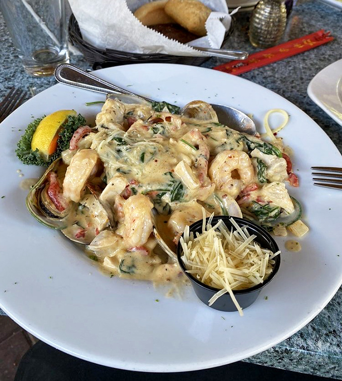 Pasta swimming in creamy sauce with plump shrimp and lobster pieces throughout. Carb-loading has never felt so justified or deliciously necessary.