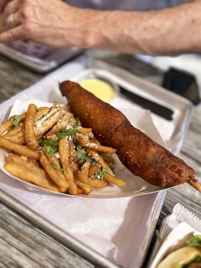 Whoever invented the lobster tail corn dog deserves a Nobel Prize in culinary creativity. Highbrow meets state fair in the best possible way.