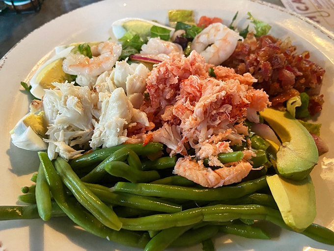 Garden-fresh green beans playing host to a seafood party where everyone's invited &ndash; crab, shrimp, and fish all dressed in their Sunday best.