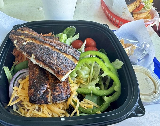 Who knew healthy eating could look this good? Blackened Mahi atop a colorful salad&mdash;Florida's answer to those sad desk lunches you left behind.