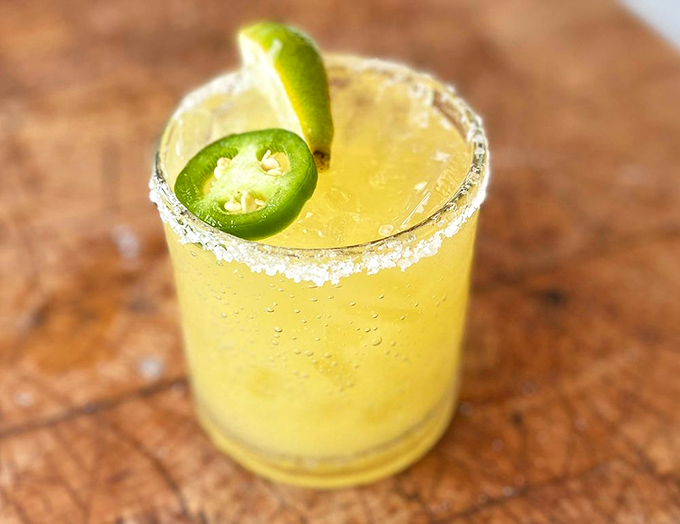 A margarita with just the right balance of sweet, sour, and kick—plus that jalapeño slice that says, "I dare you."