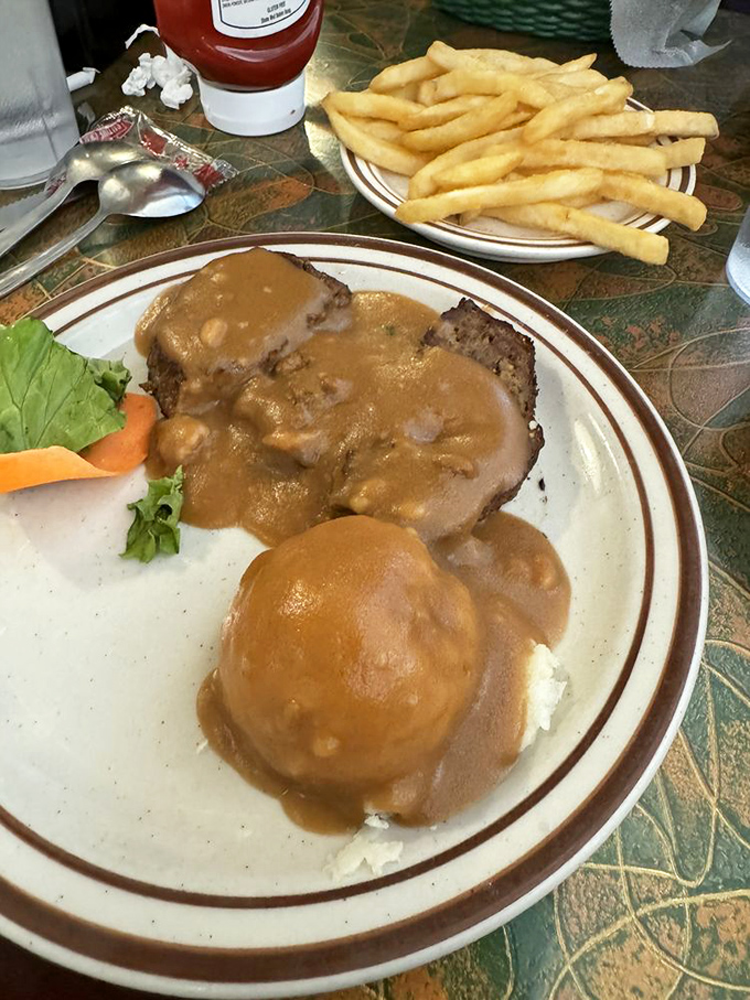 Meatloaf and mashed potatoes swimming in gravy&mdash;the kind of plate that makes you want to call your mother and apologize.