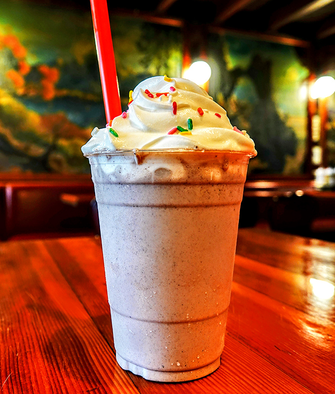 This milkshake, topped with whipped cream and rainbow sprinkles, isn't just dessert&mdash;it's childhood nostalgia in a cup with adult-sized portions.