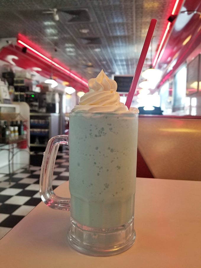 This isn't just a milkshake&mdash;it's a blue-hued fantasy topped with a cloud of whipped cream that would make your childhood self hyperventilate with excitement.