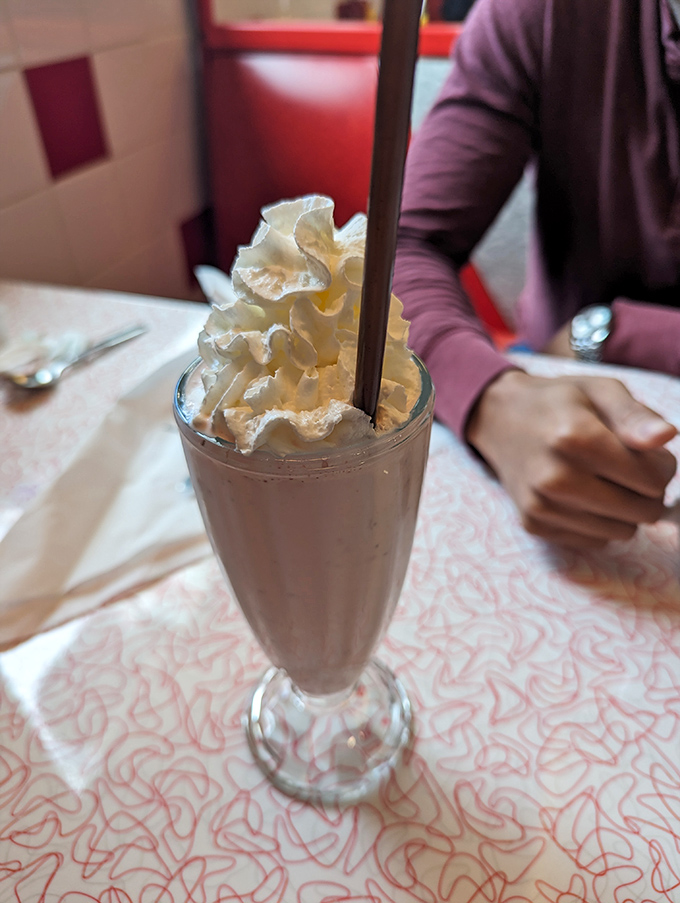 Milkshakes thick enough to require serious straw strength, topped with a cloud of whipped cream that touches the stratosphere.