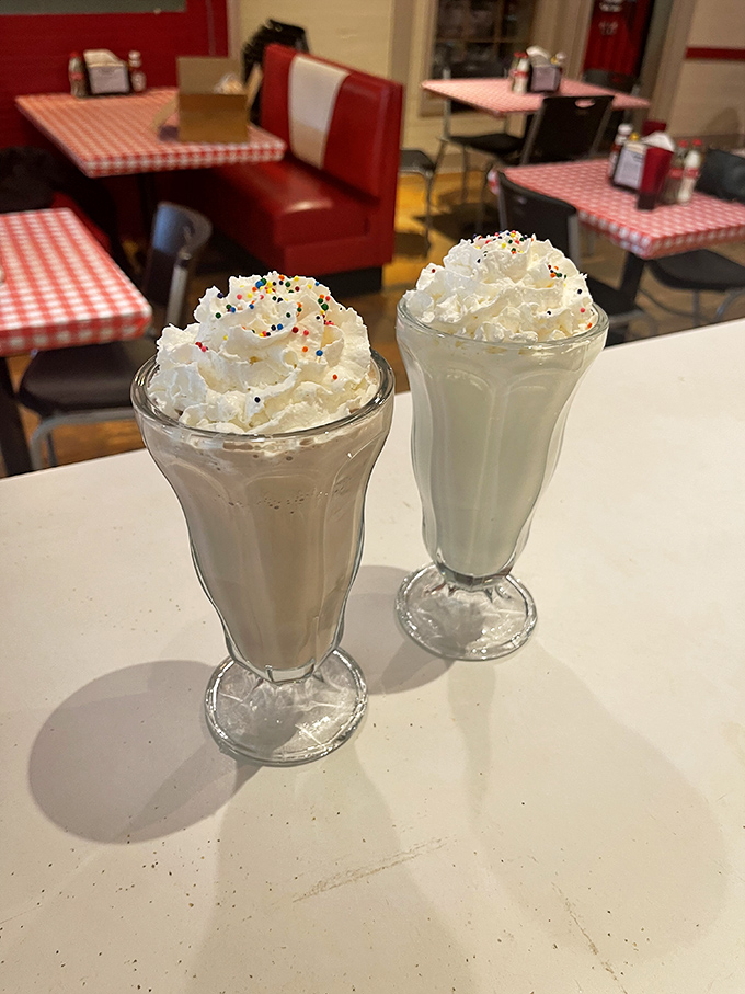 Milkshakes topped with whipped cream and sprinkles&mdash;proof that sometimes the best adult decision is ordering like an eight-year-old.
