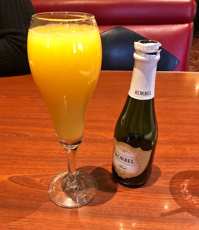 Sunshine in a glass meets celebration in a bottle. This mimosa isn't just a brunch cocktail—it's permission to start your day with sparkles.