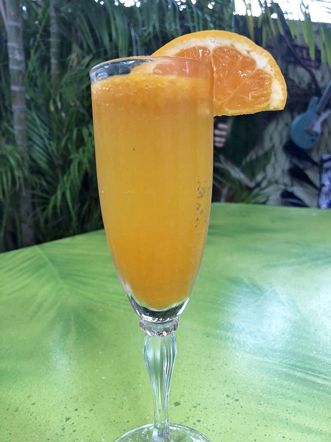 A mimosa in the garden setting isn't just a brunch cocktail&mdash;it's Florida sunshine in a flute, complete with vitamin C alibi.