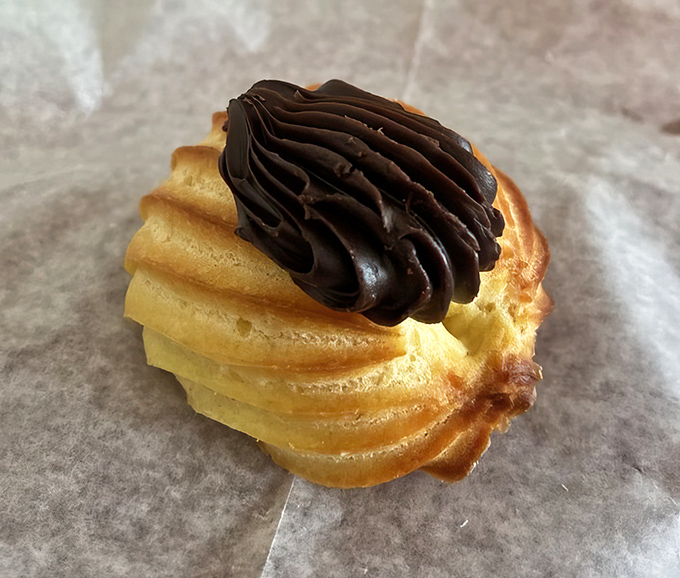 A perfect pastry paradox: this delicate &eacute;clair somehow manages to be both light as air and deeply satisfying at the same time.